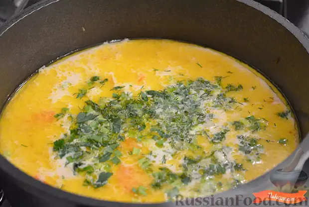 Cheese soup with smoked sausages