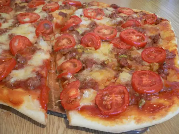 Uitstekende pizza deeg (gunsteling Italiaanse resep) + tonne toppe!