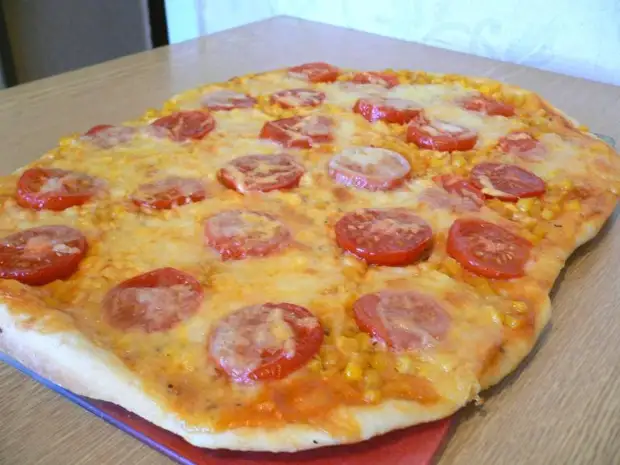 Uitstekende pizza deeg (gunsteling Italiaanse resep) + tonne toppe!