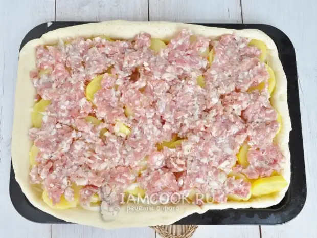 Put a layer of minced meat