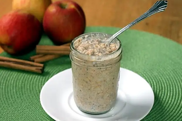 Oatmeal in a jar with apple and cinnamon