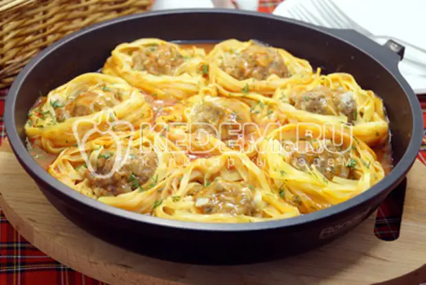 Minced meat nests in a frying pan